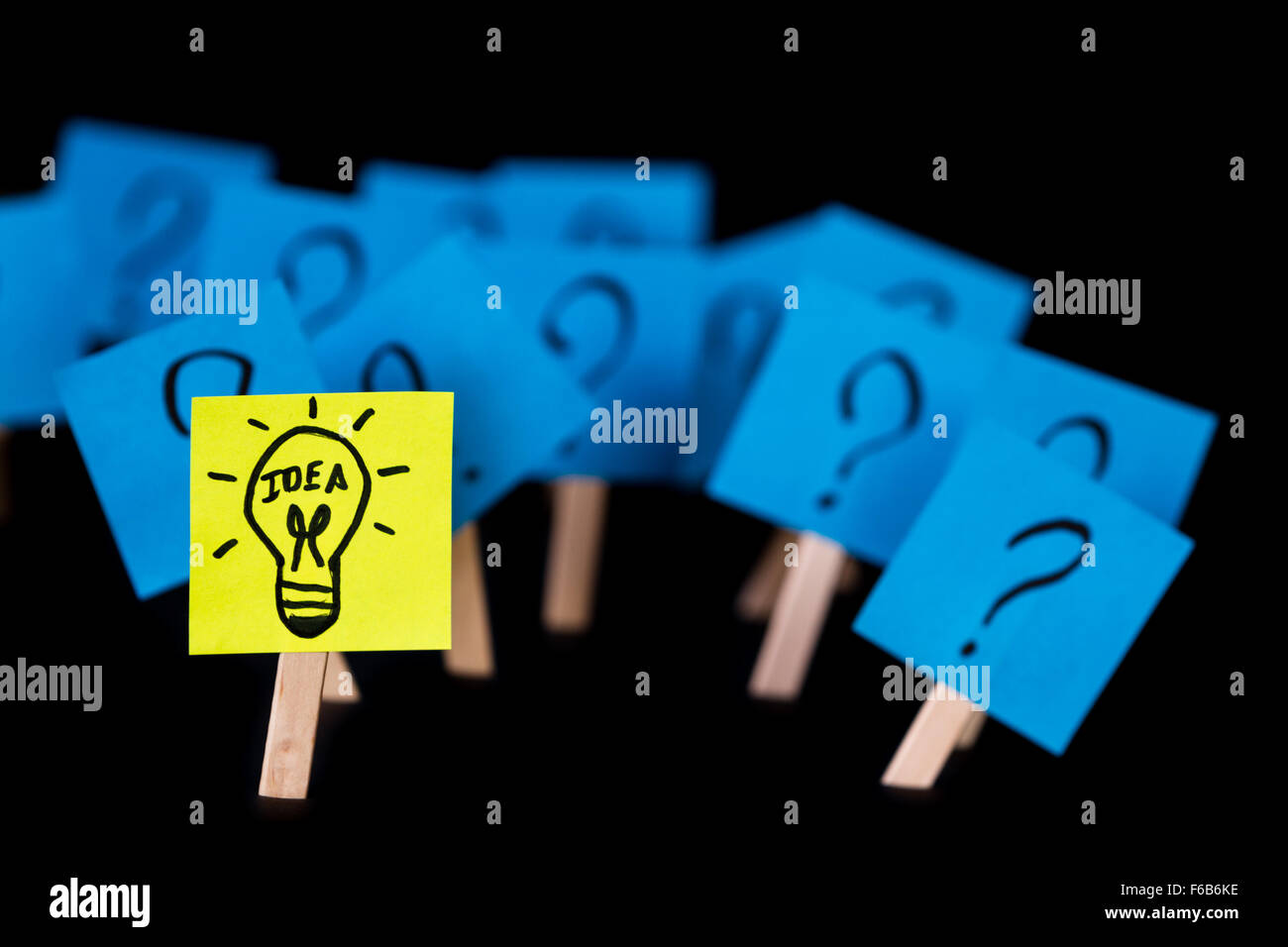 conceptual image for a good idea hand drawn on a sticky note with ...