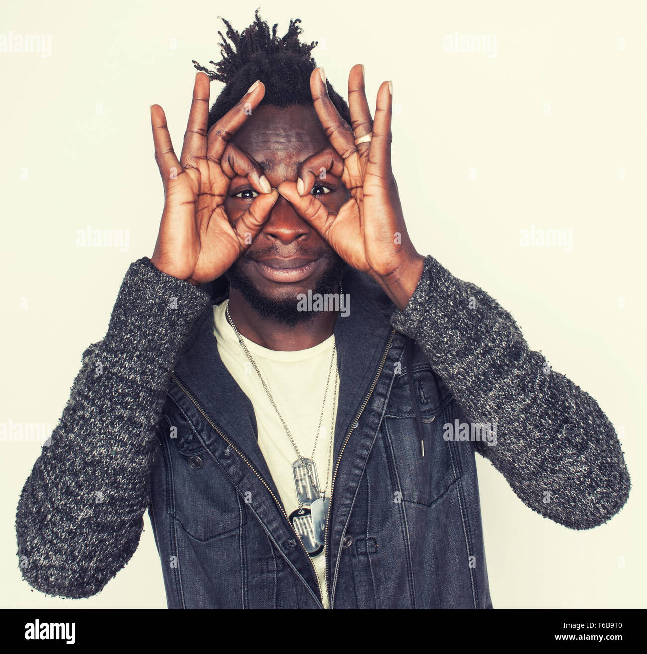 young handsome afro american man gesturing emotional posing isolated on ...