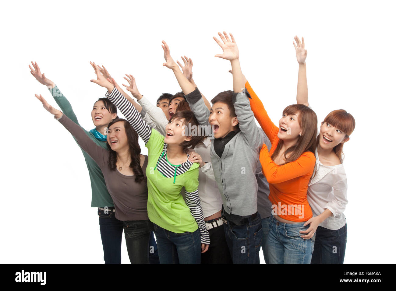 A group of young people looking up in excitement Stock Photo - Alamy