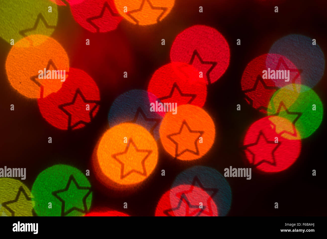 colorful Christmas stars bokeh background Stock Photo - Alamy