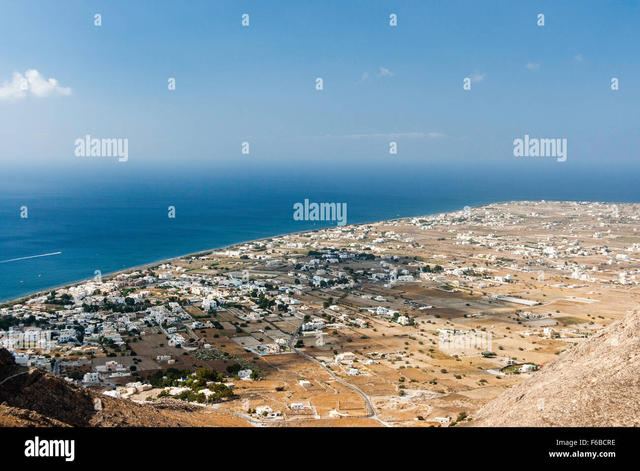 Aerial view, resort beach town Perissa on the popular holiday ...