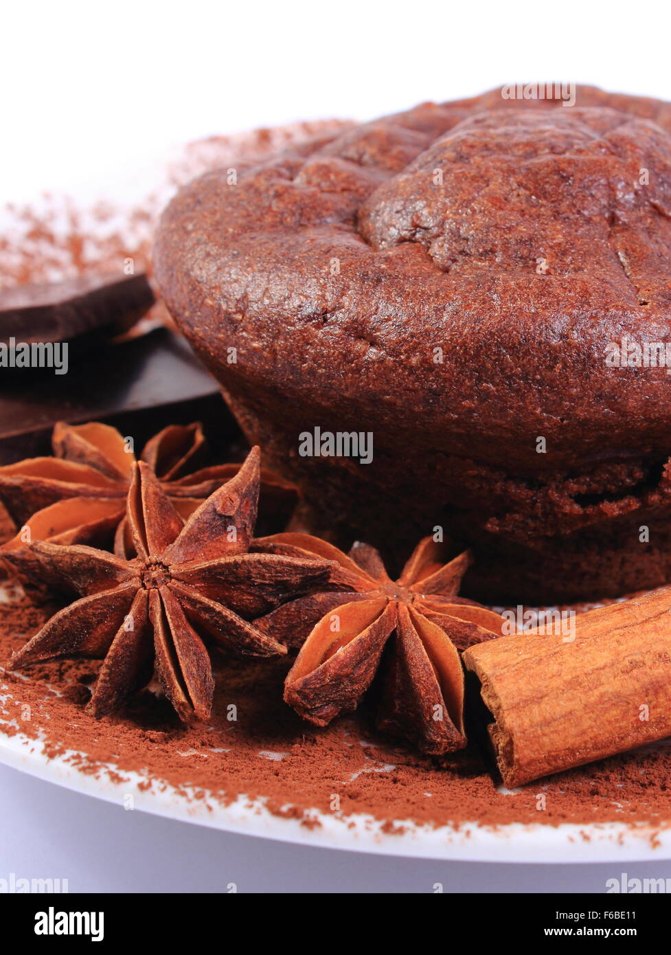 Homemade delicious fresh baked chocolate muffins with cocoa, star anise ...
