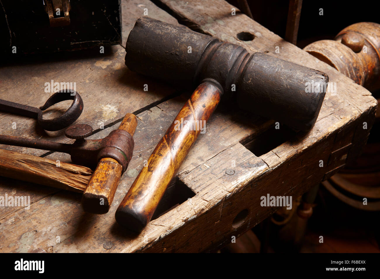 Antique Hammers and tools with wood pieces Stock Photo - Alamy