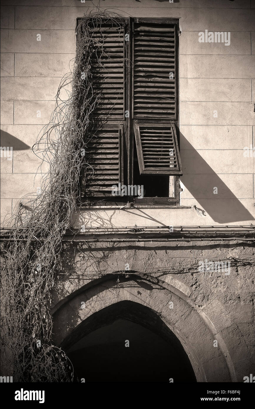 milan broke abstract old window grate shadow in italy Stock Photo - Alamy