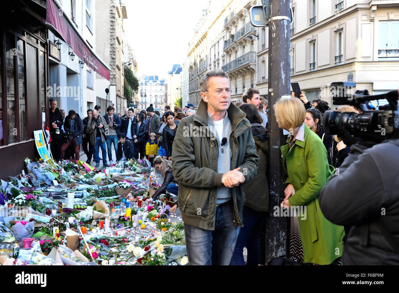 Paris, France. November 15th, 2015. Reporter in front of restaurant le ...