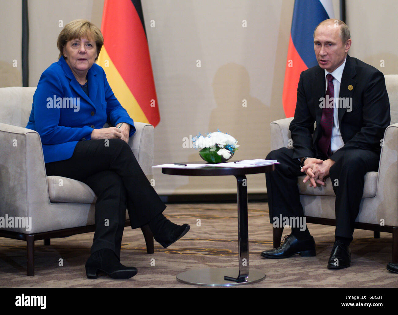 German Chancellor Angela Merkel (L) and Russian President Vladimir ...