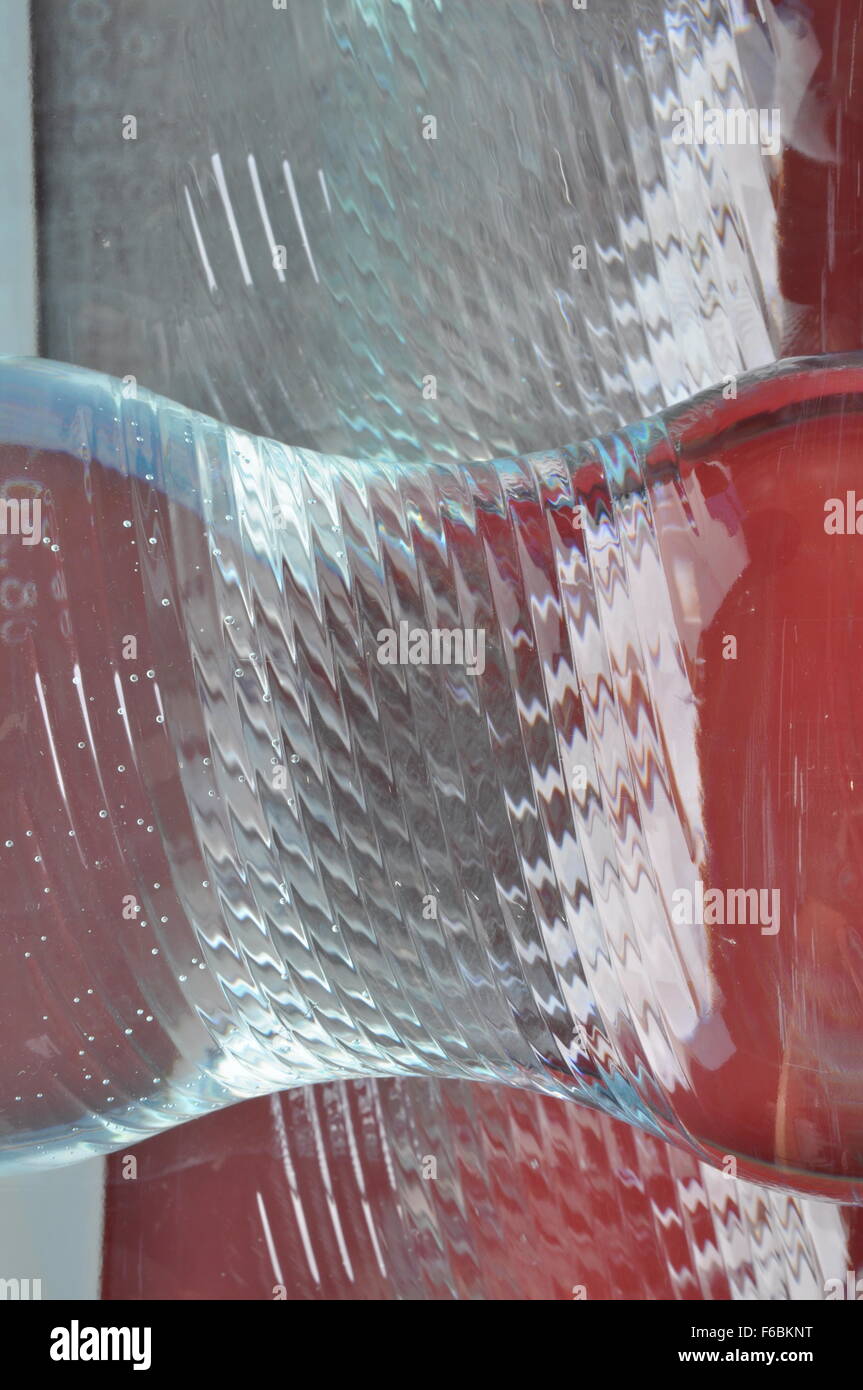 Plastic bottles texture with red background Stock Photo - Alamy