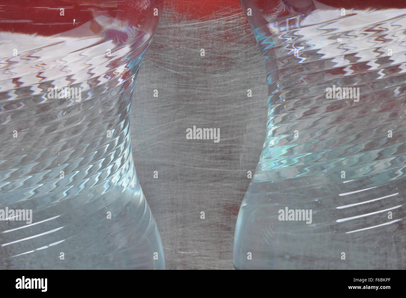 Plastic bottles texture with red background Stock Photo - Alamy