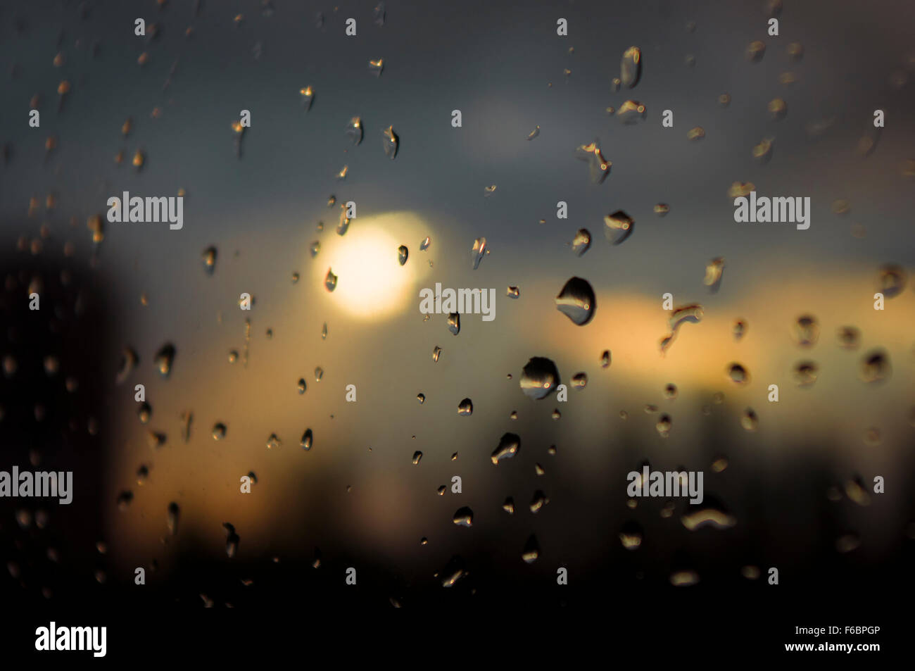 Drops of rain on window with abstract lights Stock Photo - Alamy