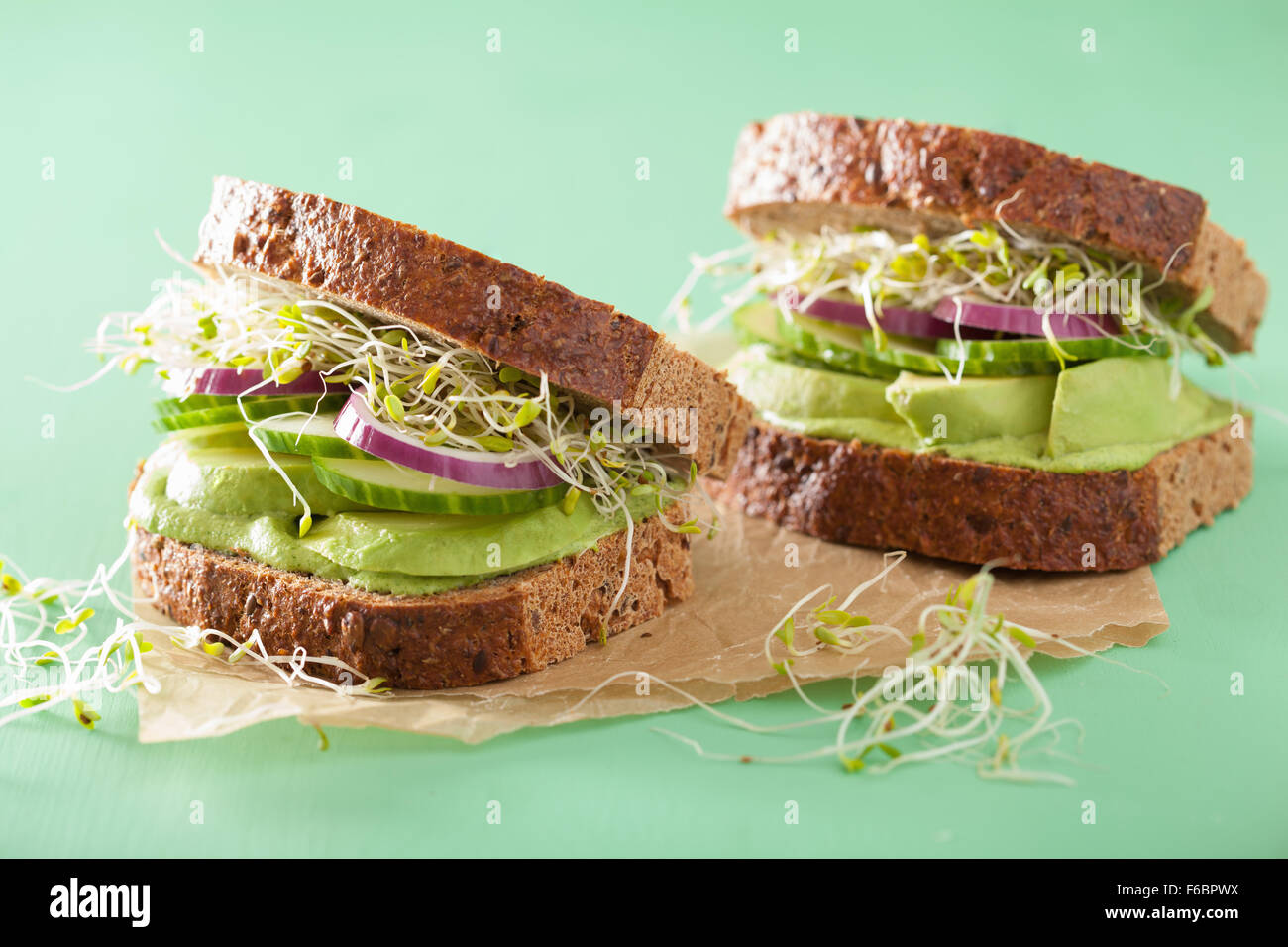 healthy avocado sandwich with cucumber alfalfa sprouts onion Stock ...