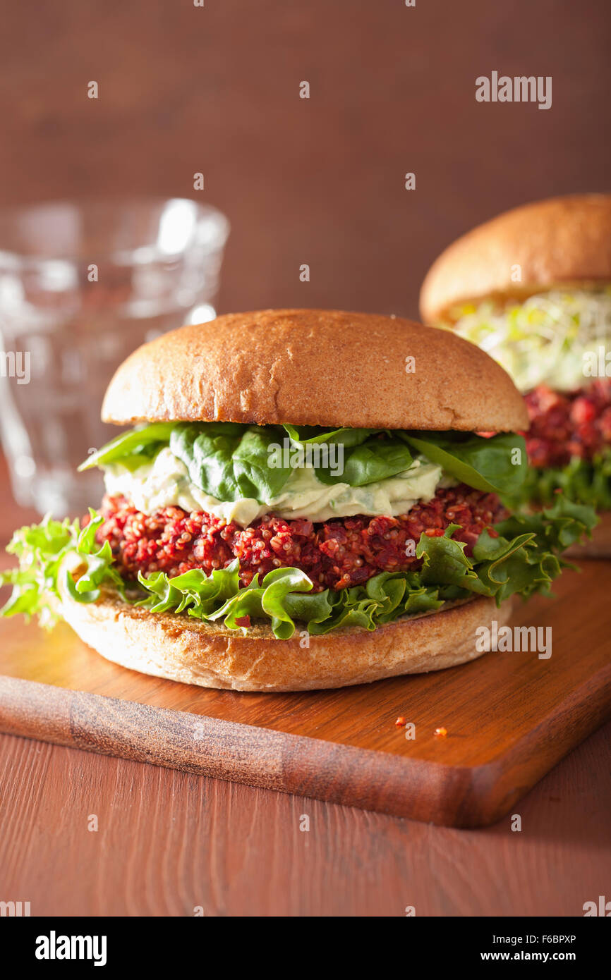 veggie beet and quinoa burger with avocado dressing Stock Photo - Alamy