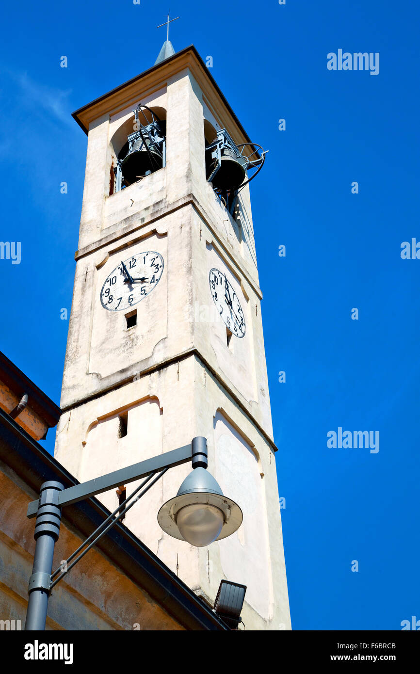 ancien clock tower in italy europe old stone and bell Stock Photo - Alamy