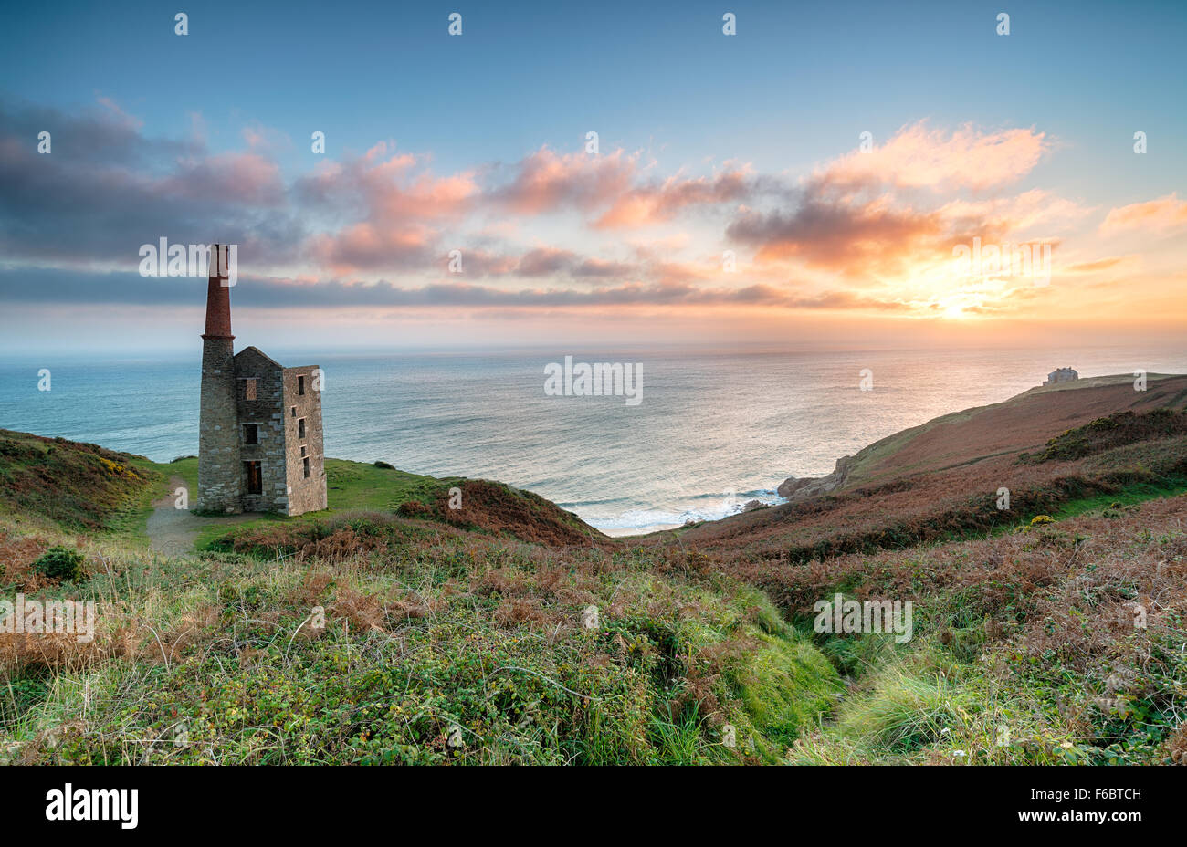 A beautiful sunset over Rinsey Head on the Cornwall Coast with the ...