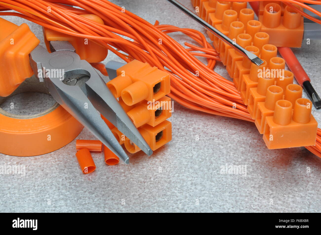 Set of electrical tools and cables on metal surface with place for text ...