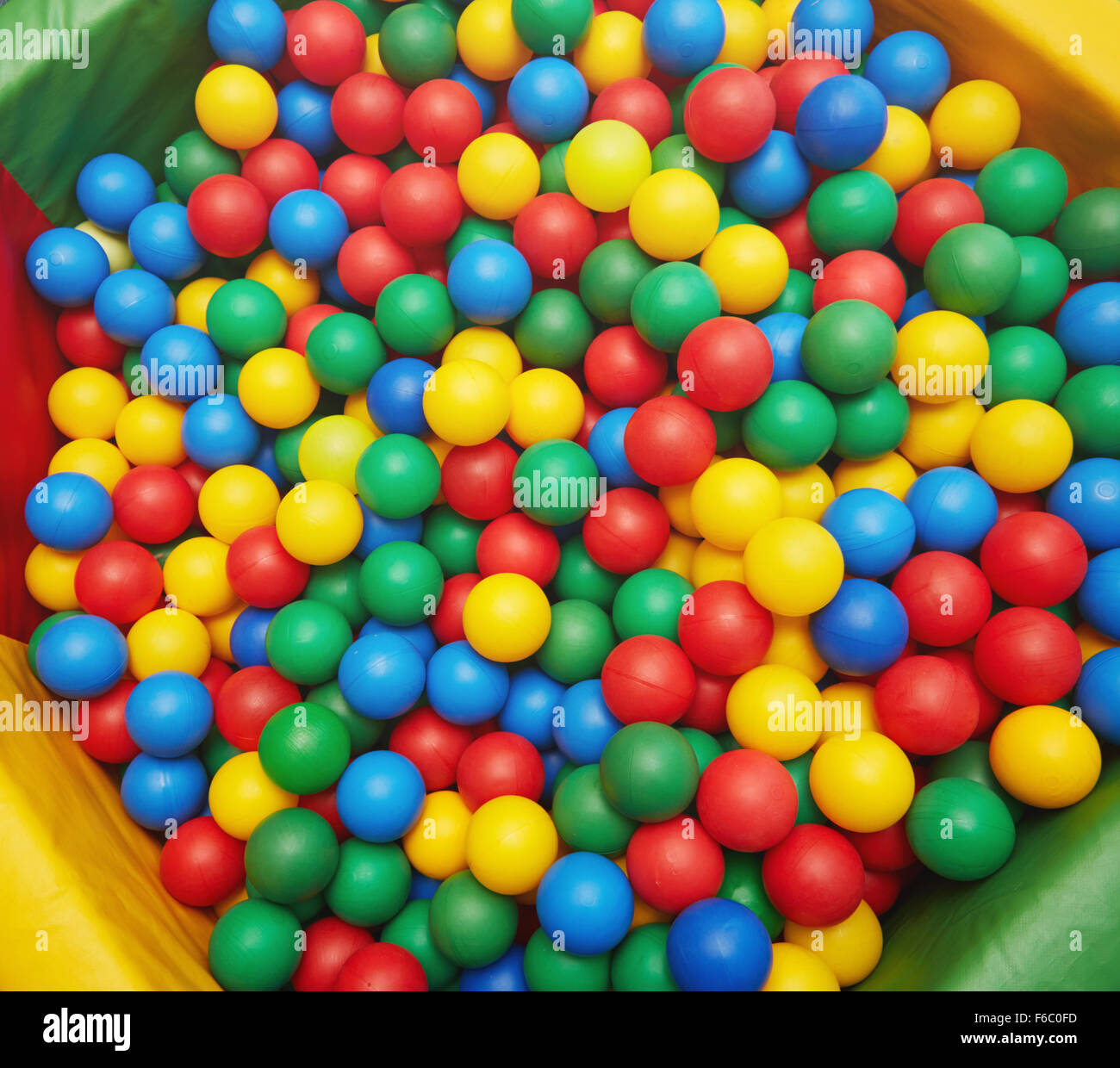 Group of many multicolored plastic balls. Close-up view Stock Photo - Alamy
