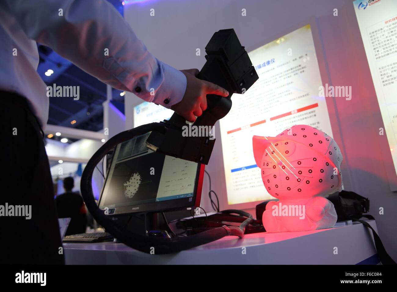 Shenzhen, China's Guangdong Province. 16th Nov, 2015. A staff member ...