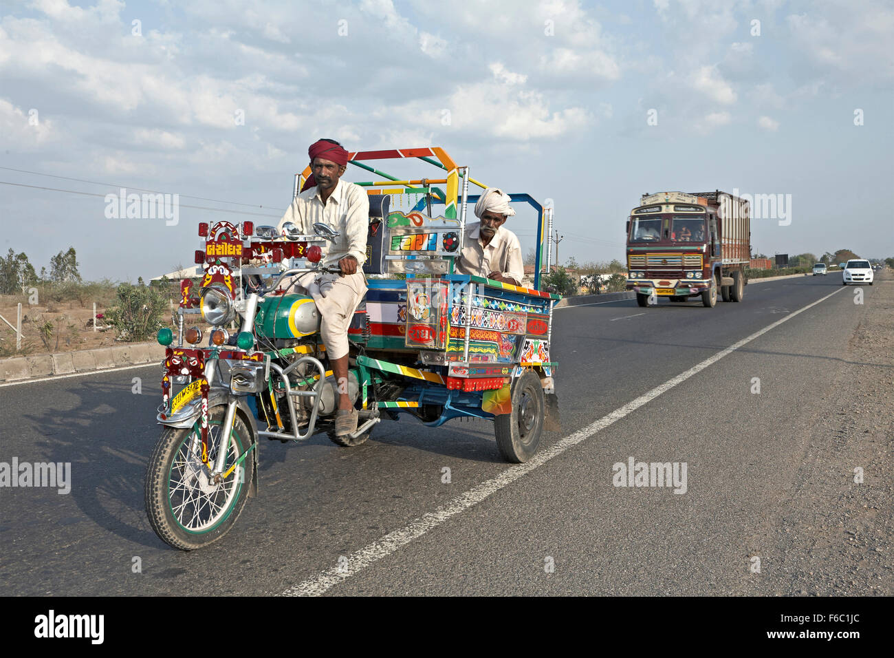 Man carrying passenger in chakda, saurashtra, rajkot, gujarat, india ...