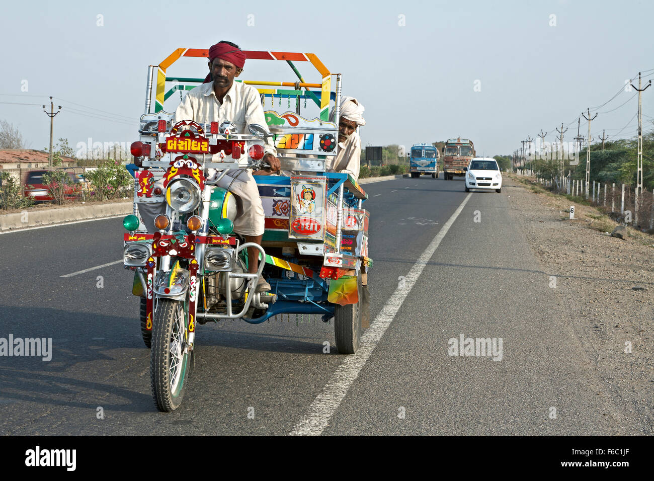 Man carrying passenger in chakda, saurashtra, rajkot, gujarat, india ...