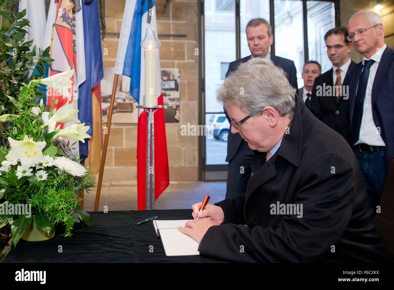 French Honorary Consul Matthias Everding (FRONT) writes an entry in the ...