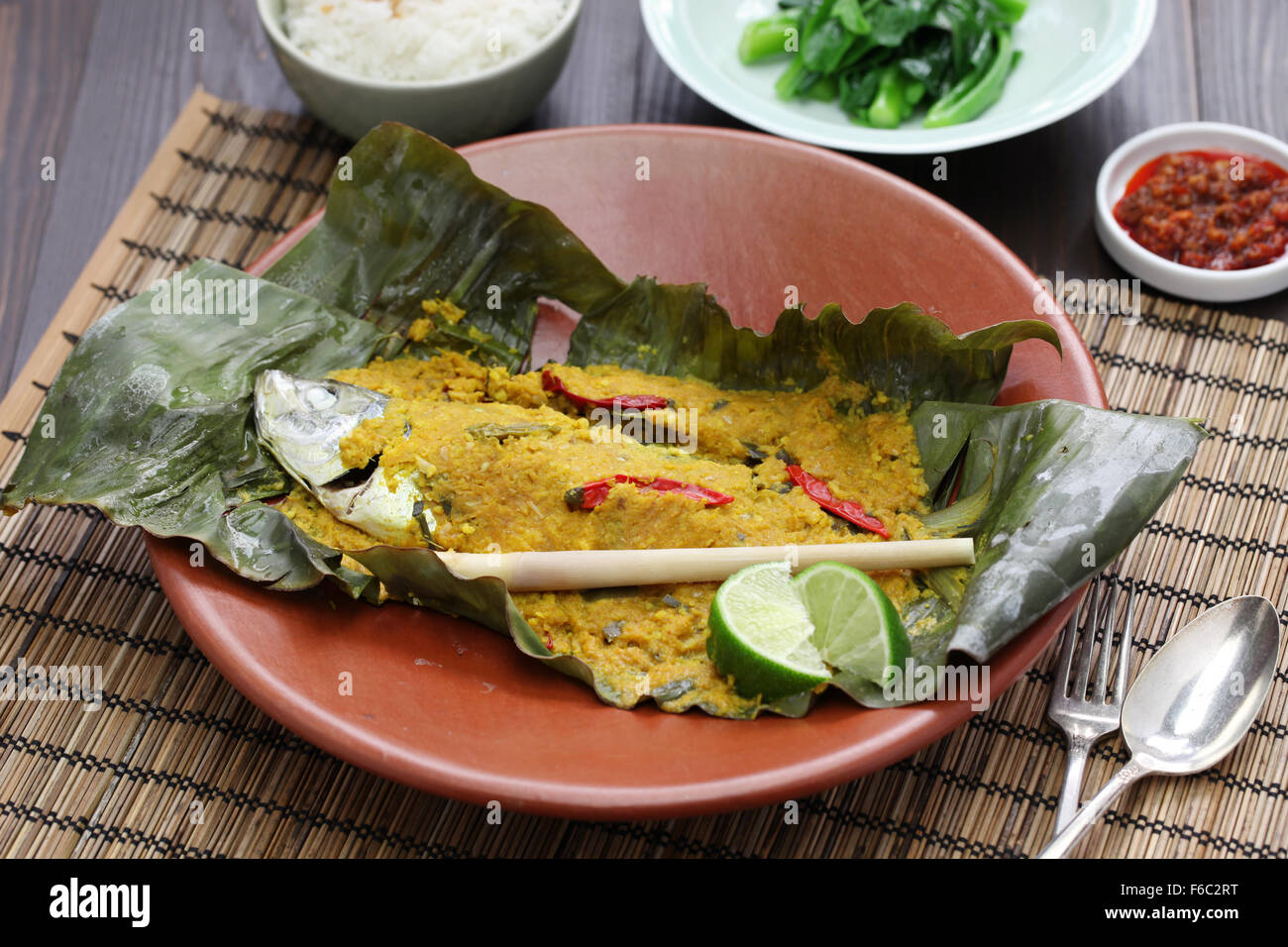 ikan pepes, indonesian cuisine, steamed fish wrapped in banana leaves ...