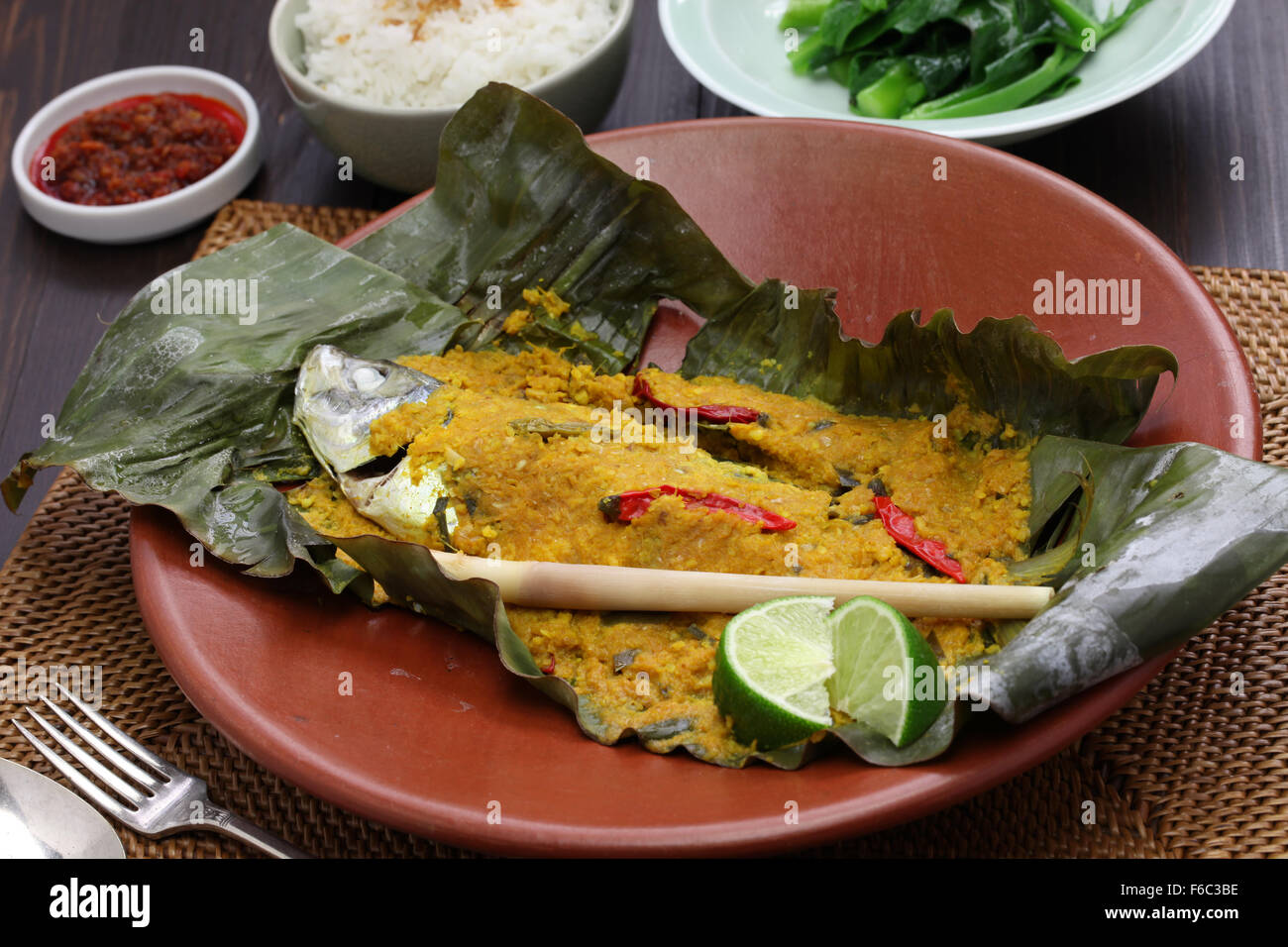 ikan pepes, indonesian cuisine, steamed fish wrapped in banana leaves ...