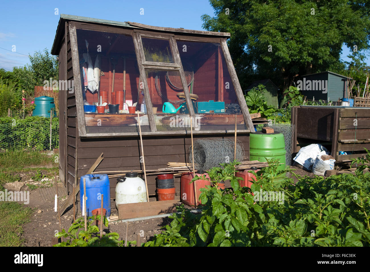 A potting shed / garden shed with large open glass front area ready for ...