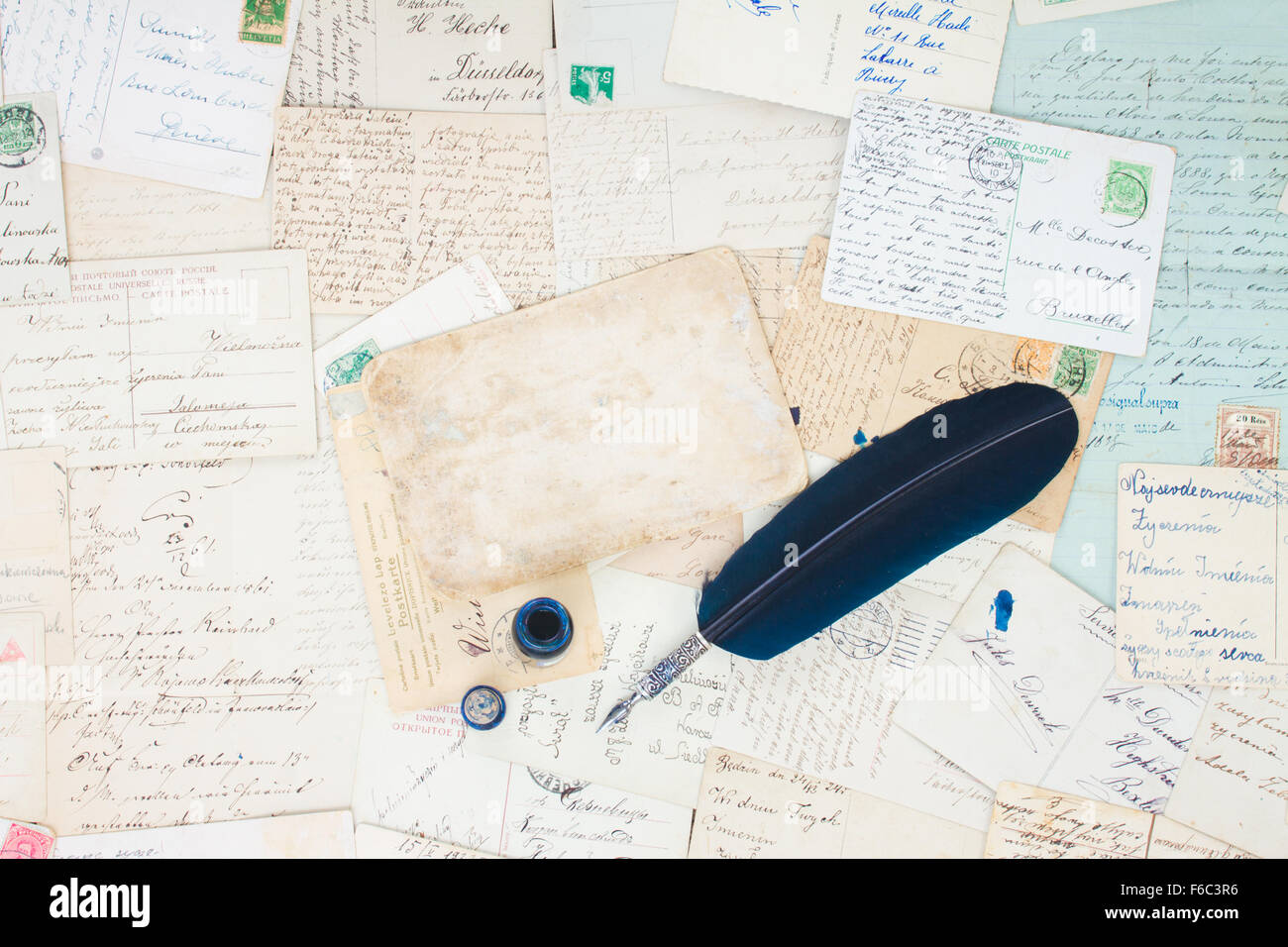 feather pen and letters Stock Photo - Alamy