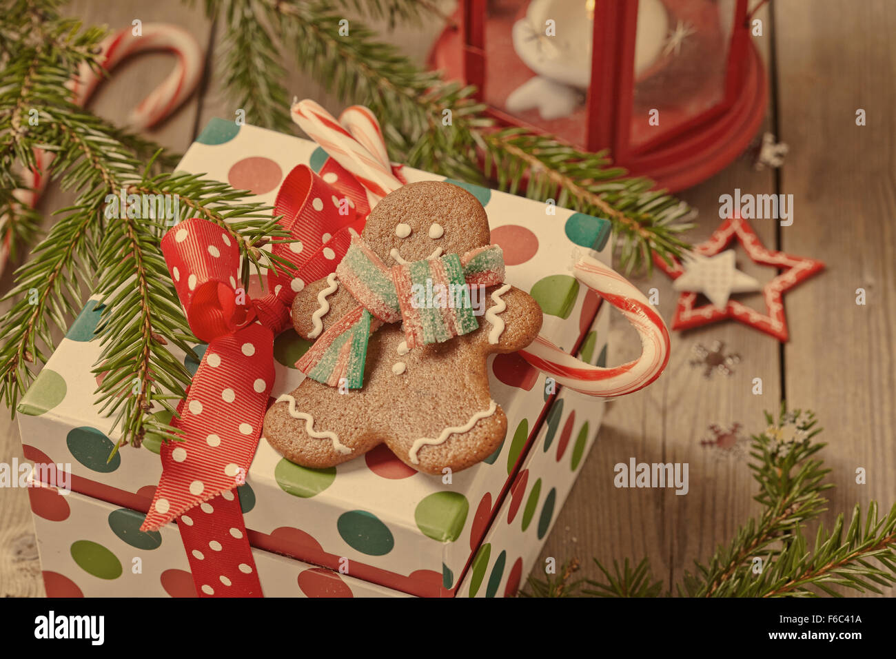 Christmas Decorations with Gingerbread man and Gift Box Stock Photo - Alamy