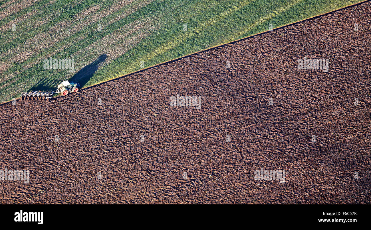 Pegau, Germany. 3rd Nov, 2015. A farmer plows his field near Pegau ...