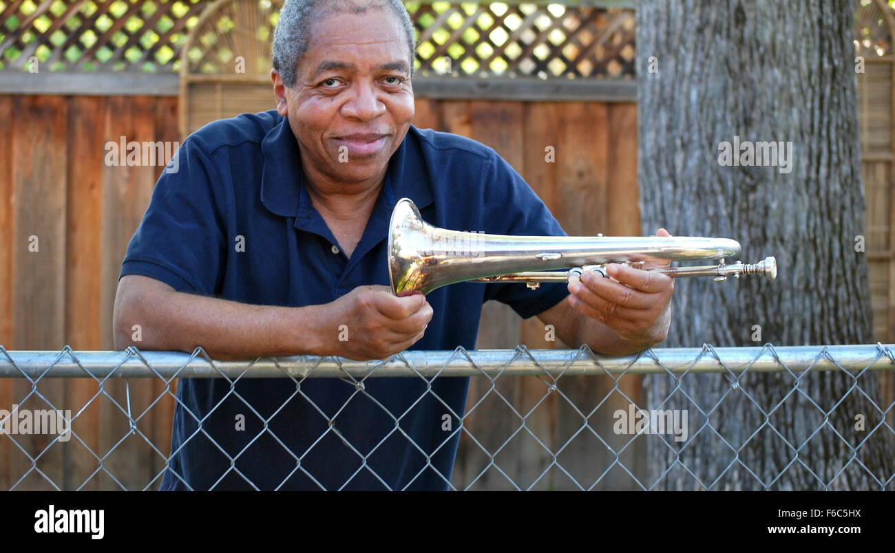 Jazz musician with his horn Stock Photo - Alamy