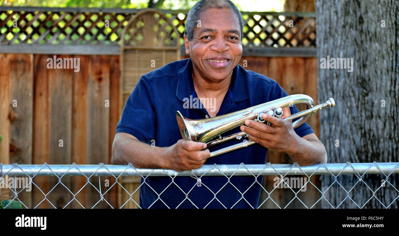 Jazz musician with his horn Stock Photo - Alamy
