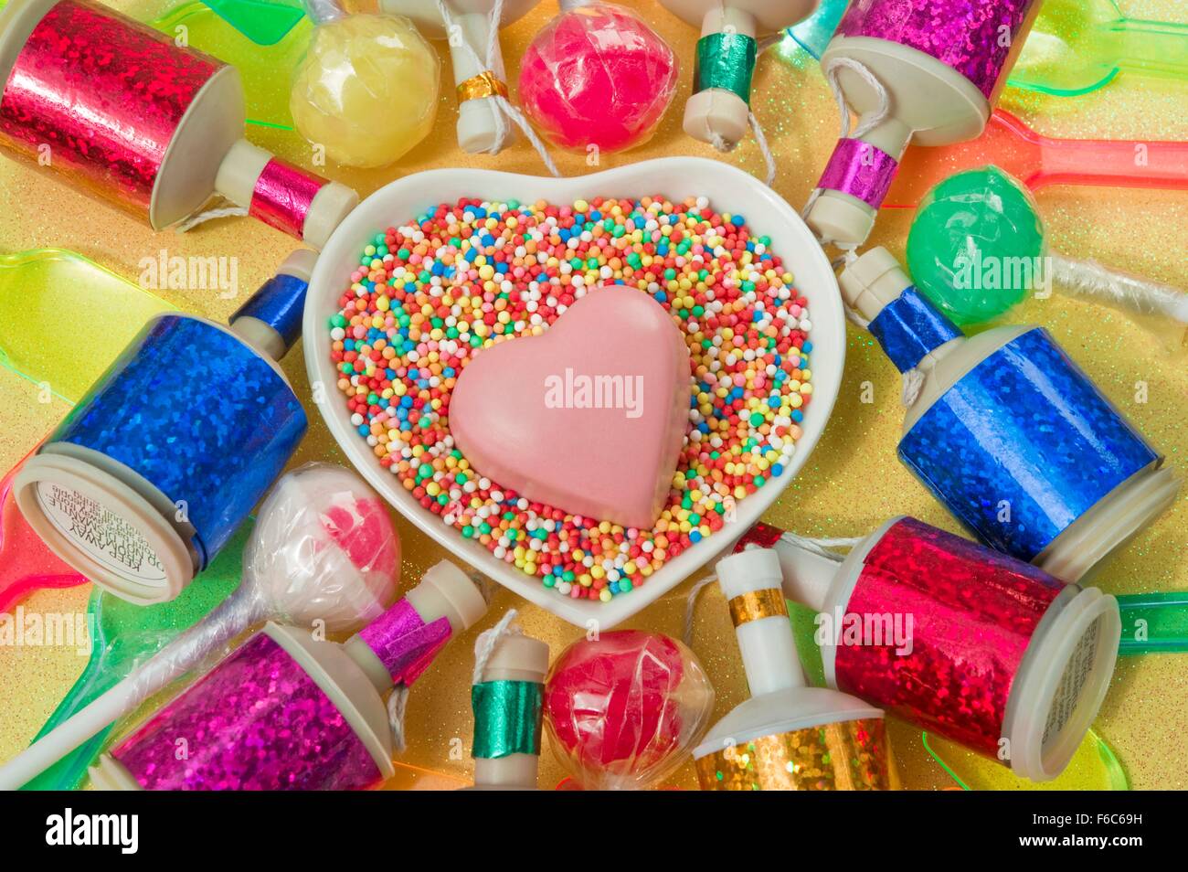 overview still life close up of heart dish with a pink chocolate heart ...