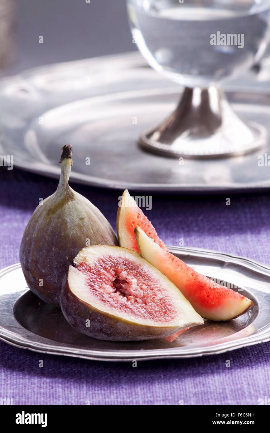 Figs on a silver plate Stock Photo - Alamy