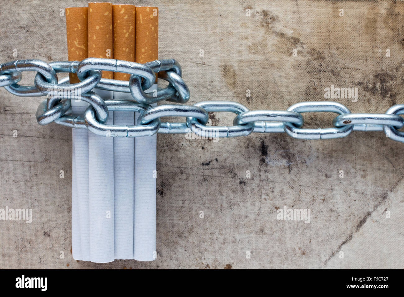 Chained cigarettes. Conceptual image for stop smoking Stock Photo - Alamy