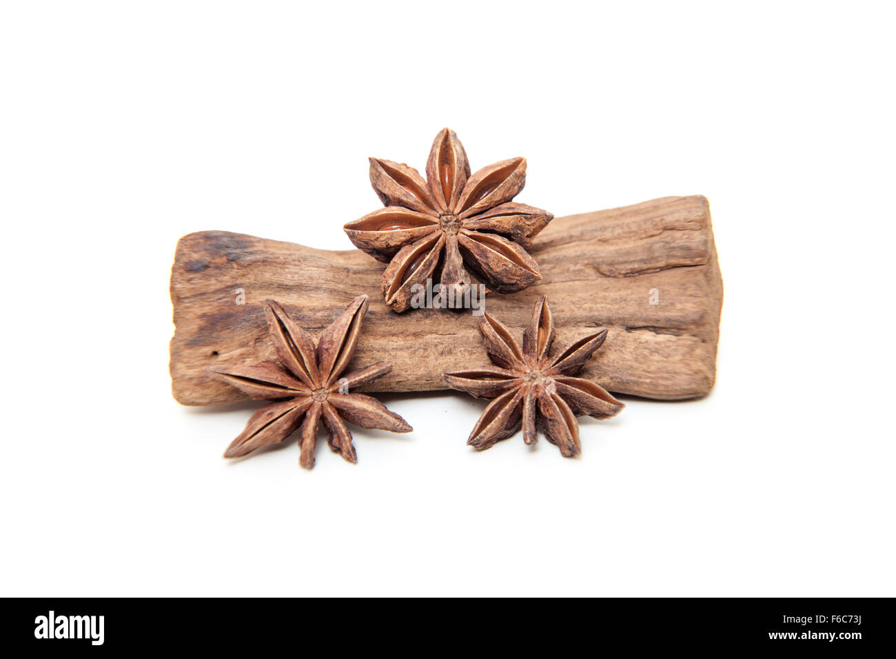 Fine star anis on white background Stock Photo - Alamy