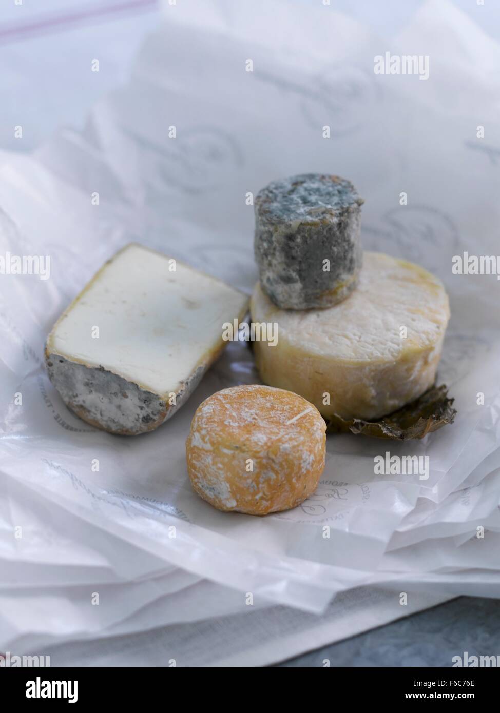 Four different types of goat's cheese Stock Photo - Alamy