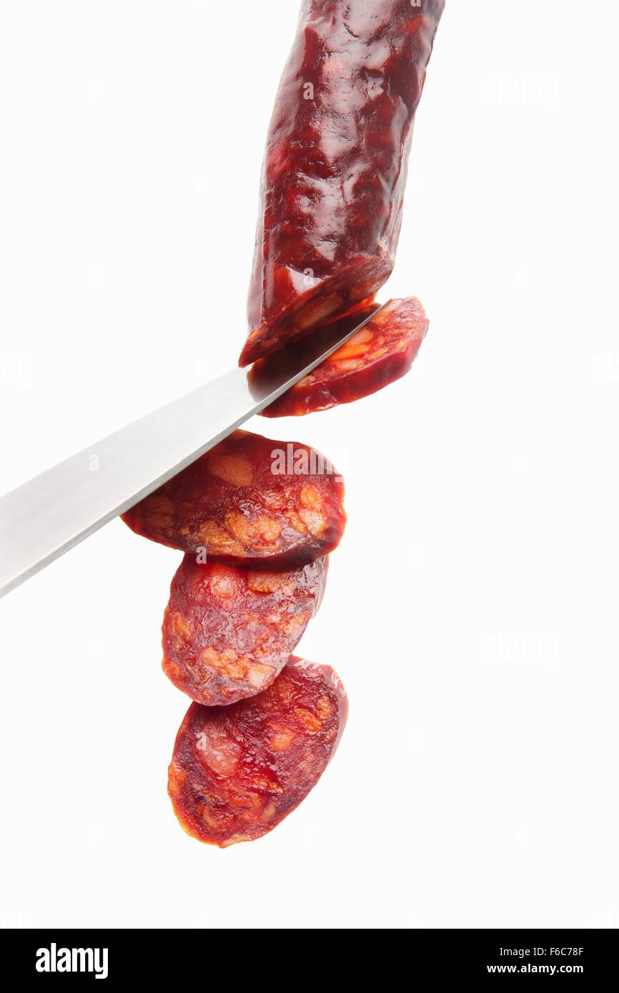 Chorizo sausage being cut hi-res stock photography and images - Alamy