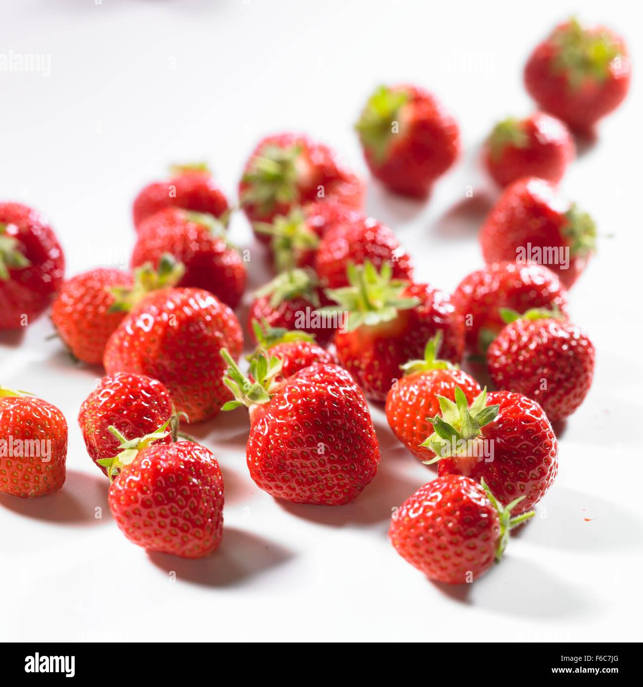 Strawberries with shadow hi-res stock photography and images - Alamy