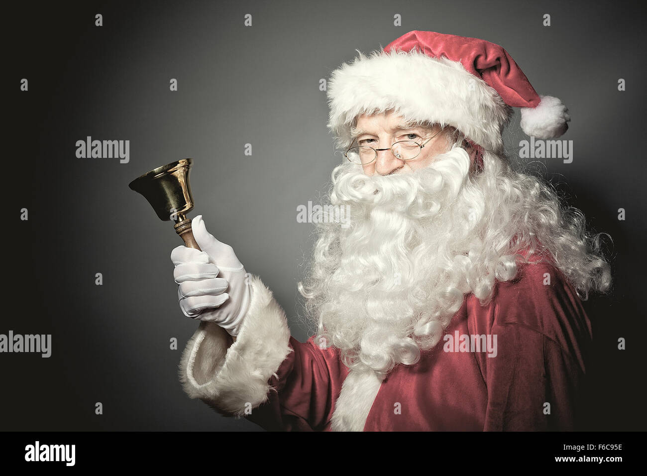 santa claus classic portrait on gray background Stock Photo - Alamy