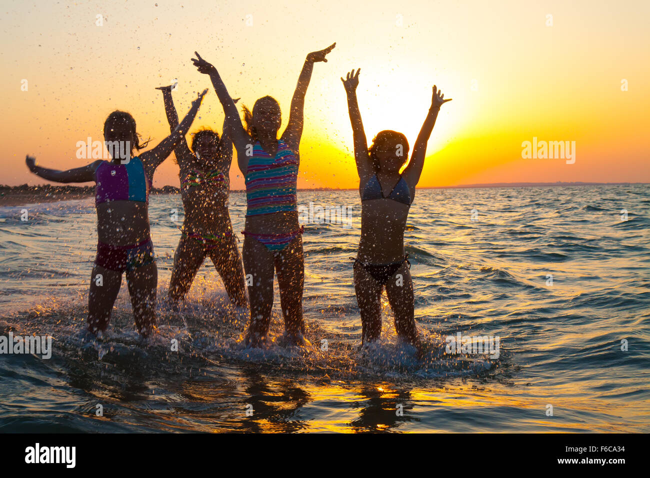 Jumping with spray hi-res stock photography and images - Alamy