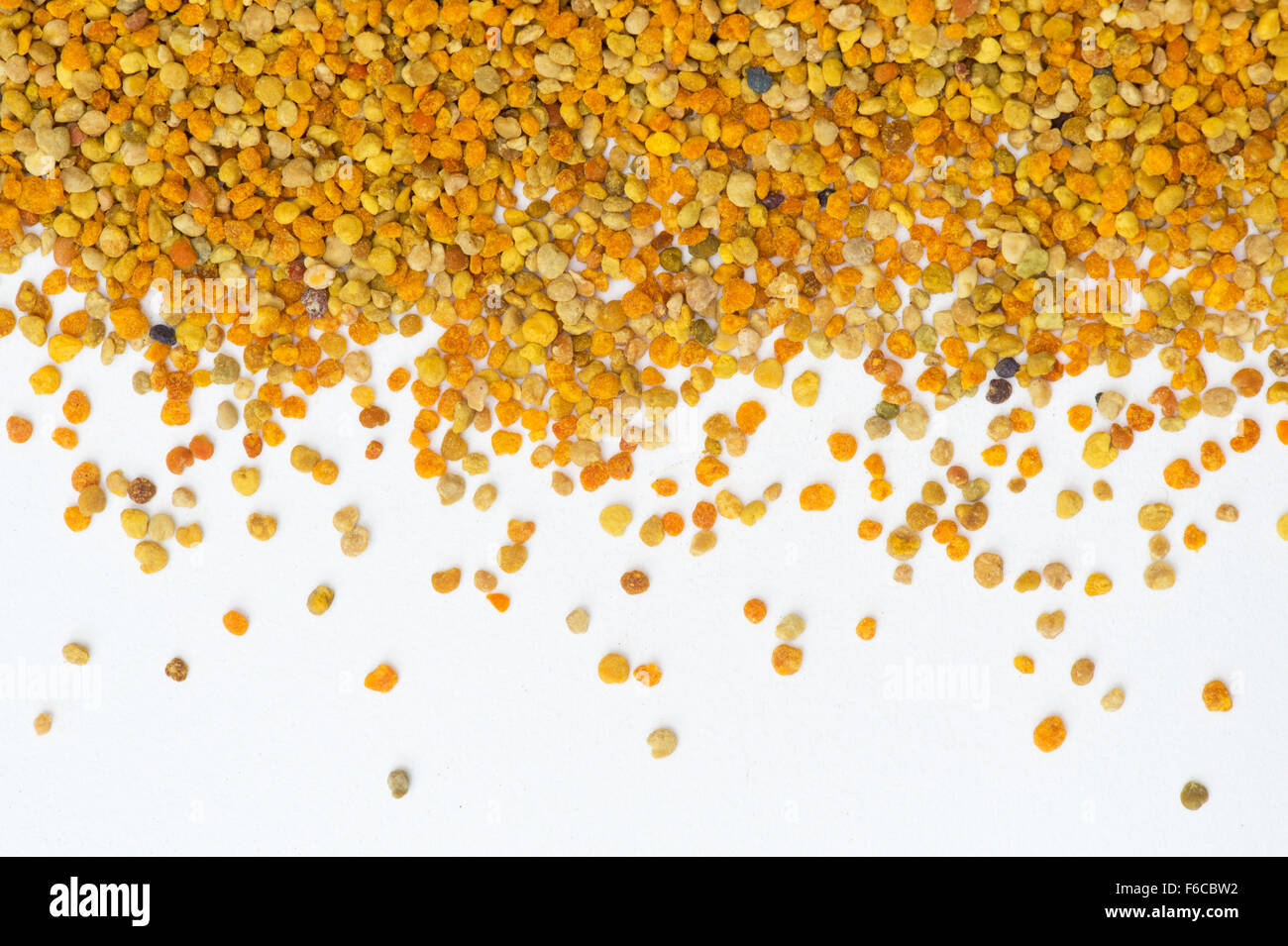 Bee Pollen on white background Stock Photo - Alamy