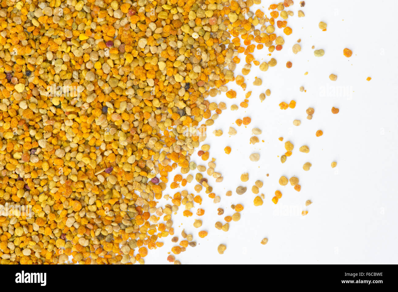 Bee Pollen on white background Stock Photo - Alamy