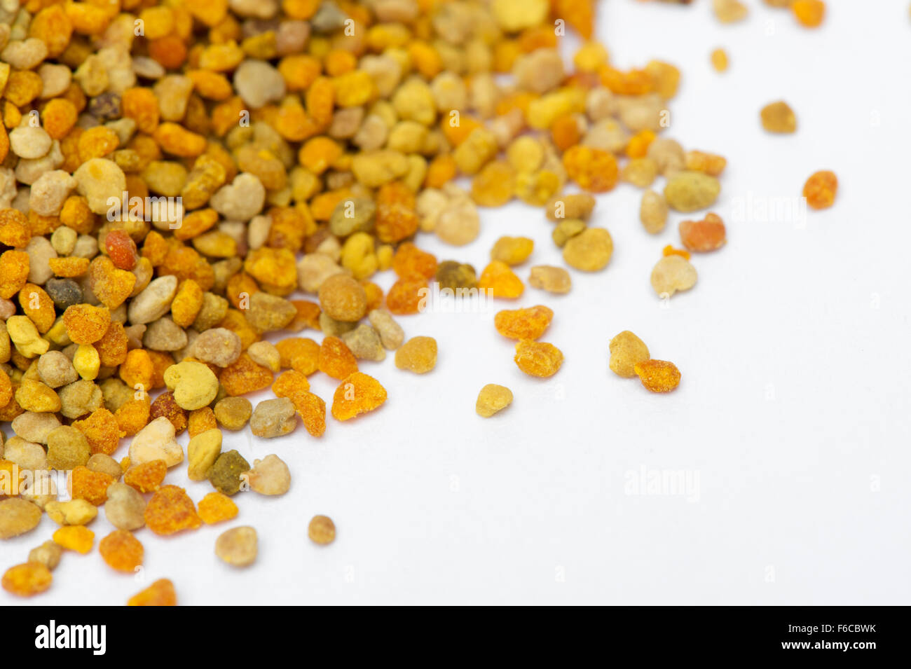 Bee Pollen on white background Stock Photo - Alamy