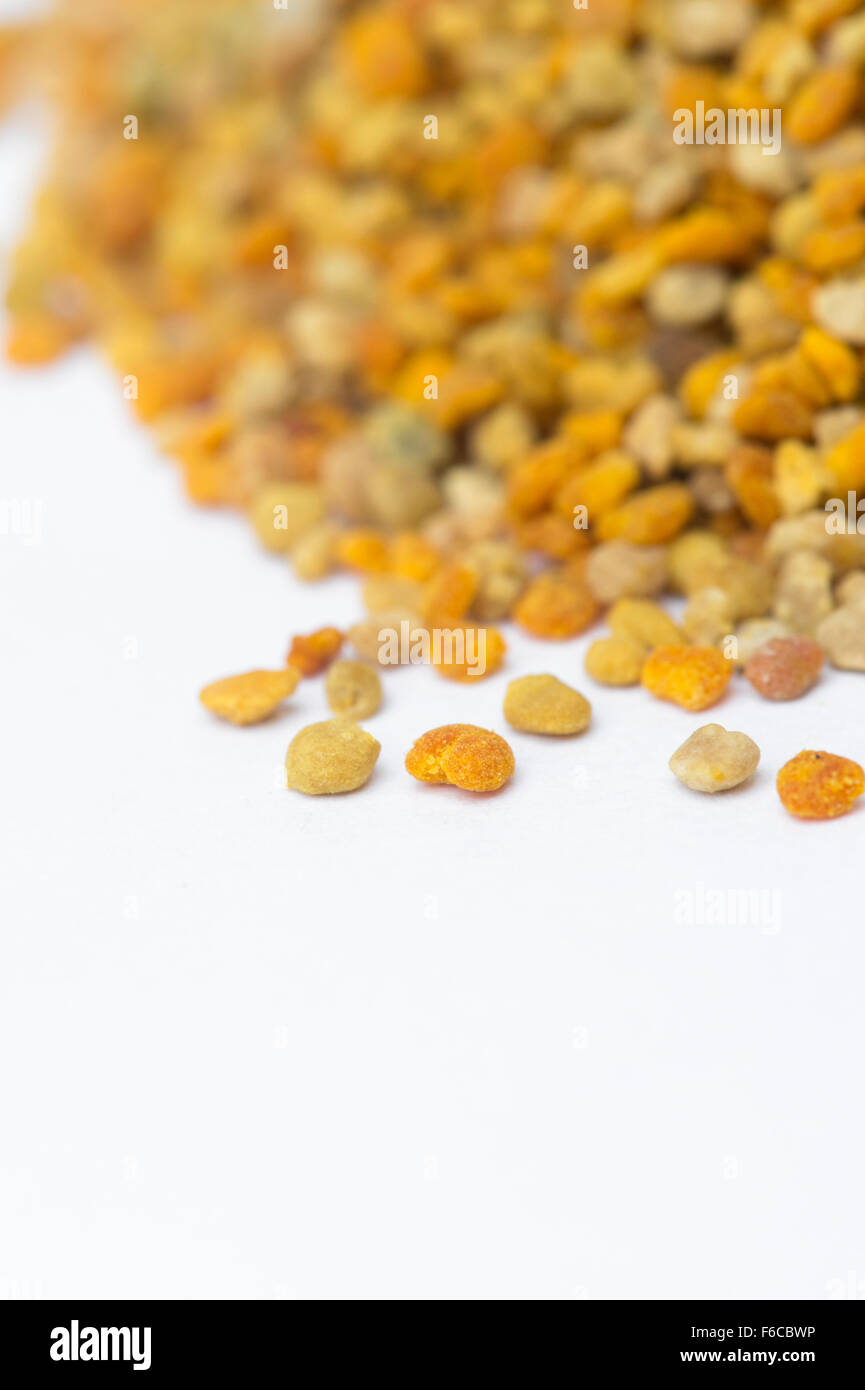 Bee Pollen on white background Stock Photo - Alamy