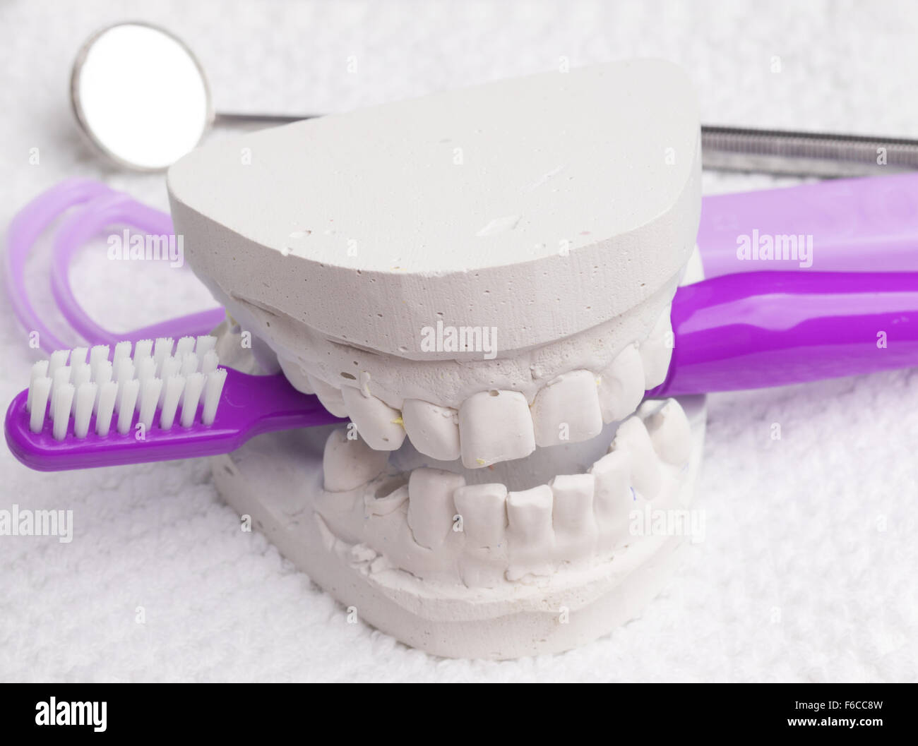Oral hygiene health concept. Closeup blue toothbrush mirror and tongue ...