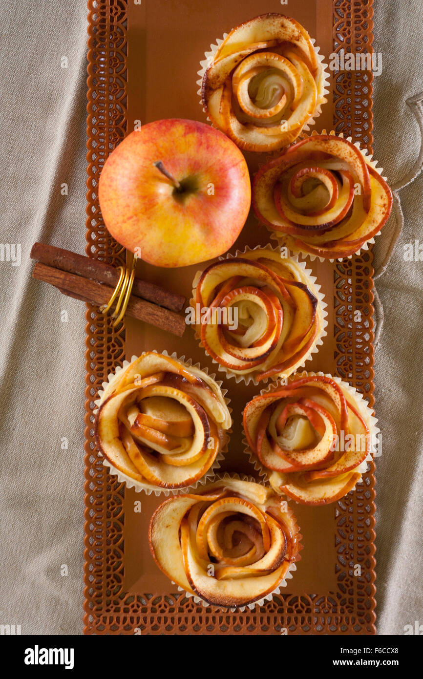 Rose shaped apple sweets flavored with cinnamon Stock Photo - Alamy