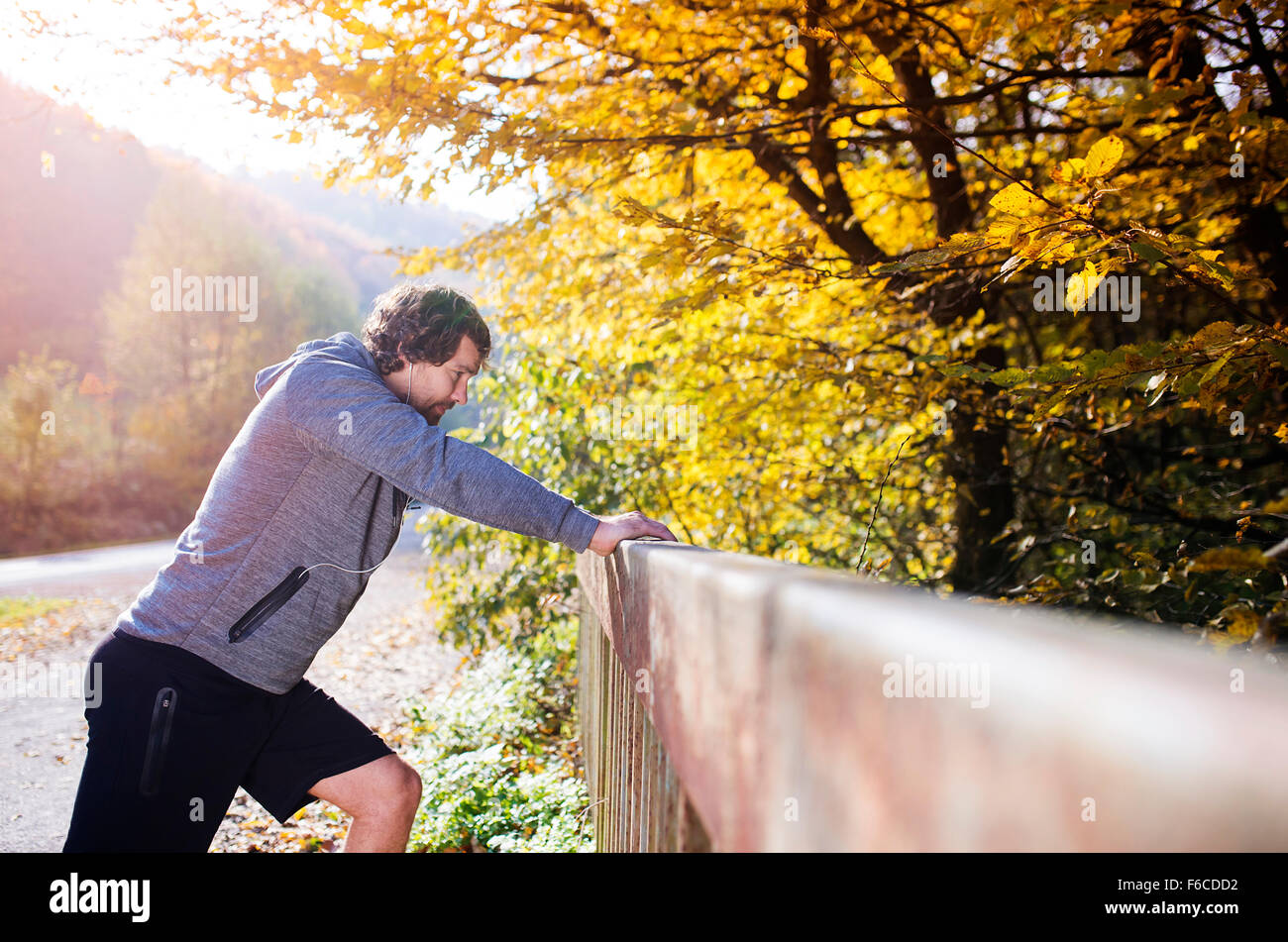 Young handsome man on bridge hi-res stock photography and images - Alamy