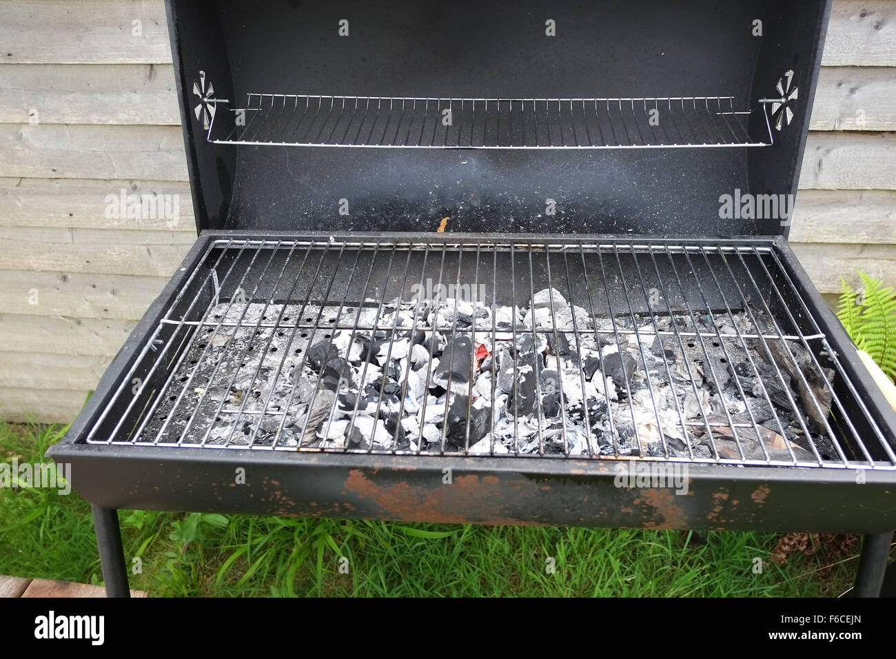 Stages of a drum type barbecue Stock Photo - Alamy