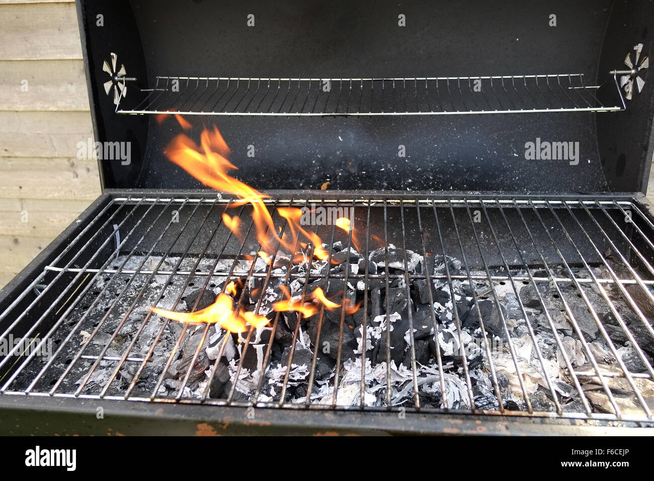 Stages of a drum type barbecue Stock Photo - Alamy