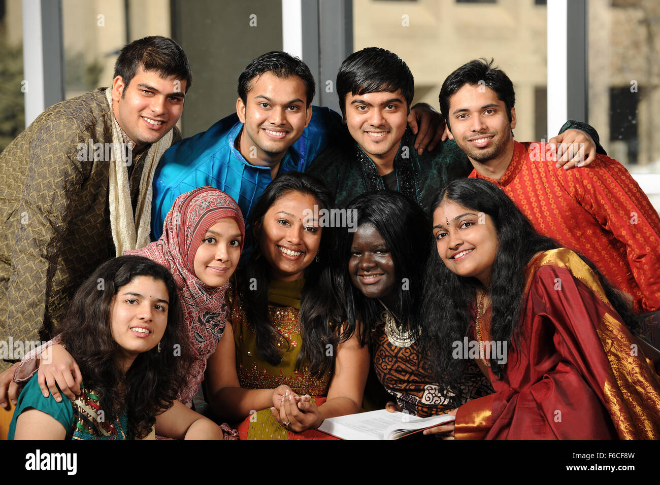 Group of diverse college students dressed in traditional attire Stock ...